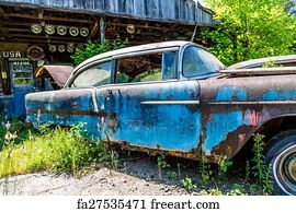 Free art print of Old Blue Rusted. An Old Blue Rusted out car in front ...