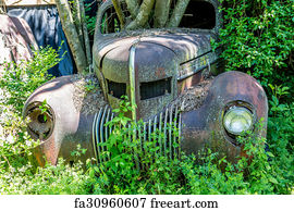 Free art print of Old Blue Rusted. An Old Blue Rusted out car in front ...